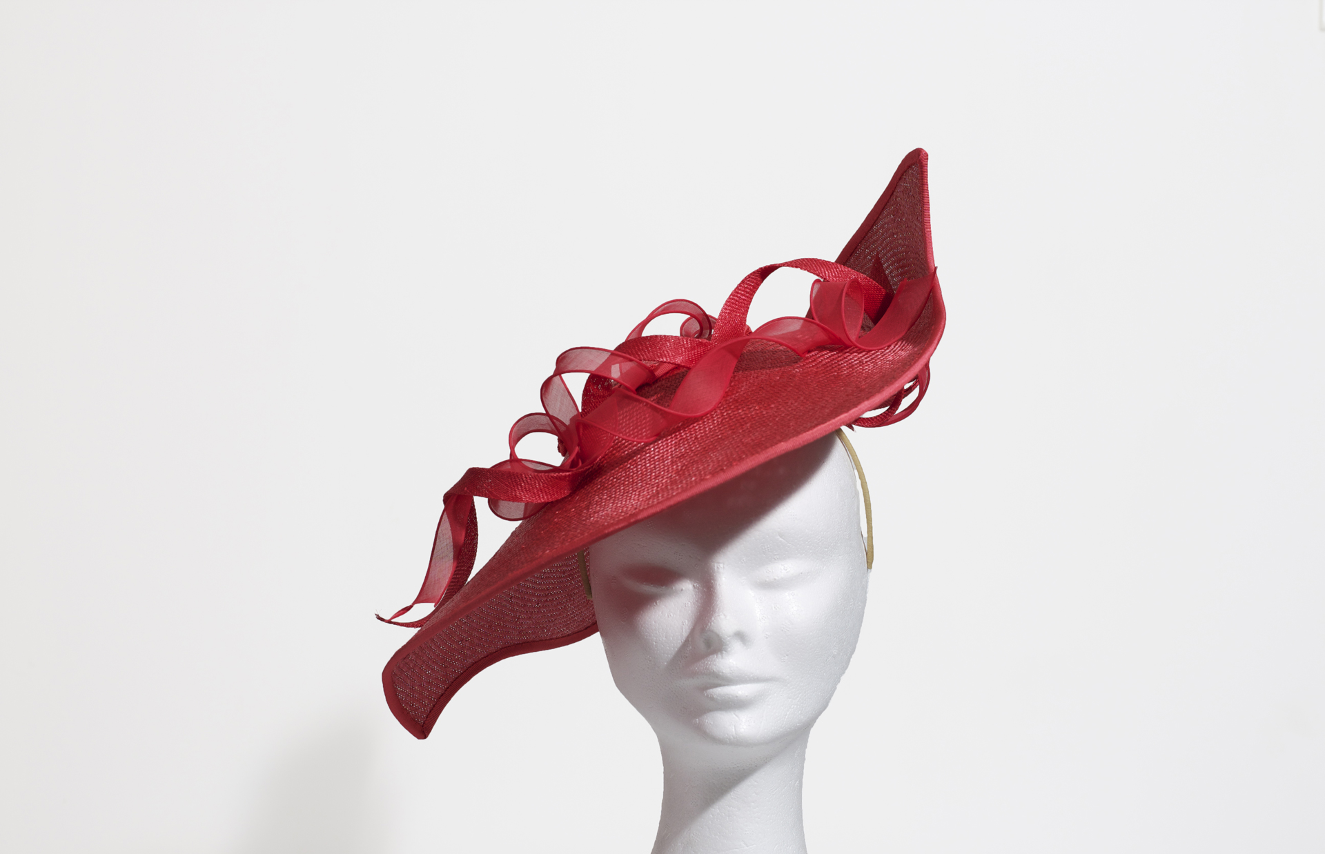 Red straw two pointed tilt disc hat with red coil trim - Leonie Doore ...